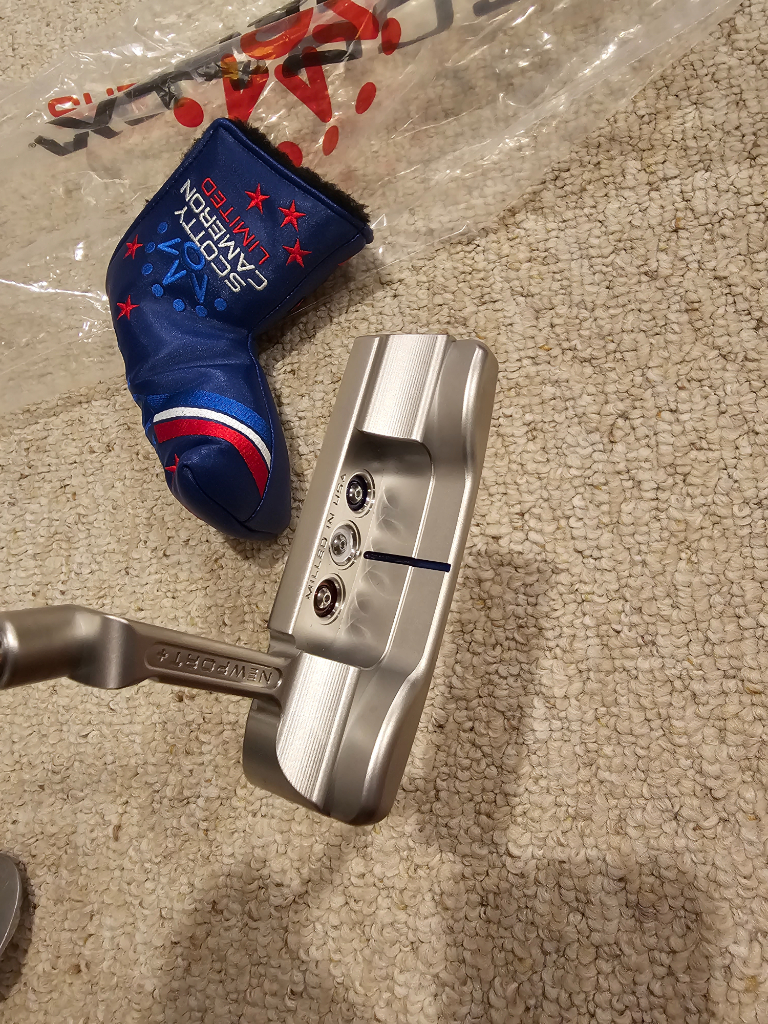 Nike B2-01, Tour Edge Exotics EXi irons, Scotty Cameron Champions ...
