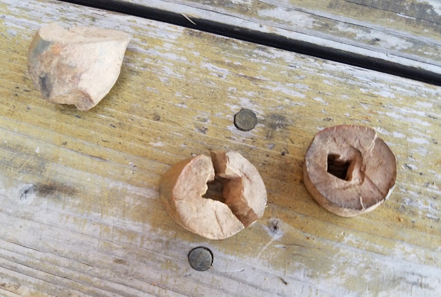 Jurrasic shale cylinders with a square hole down the center ...