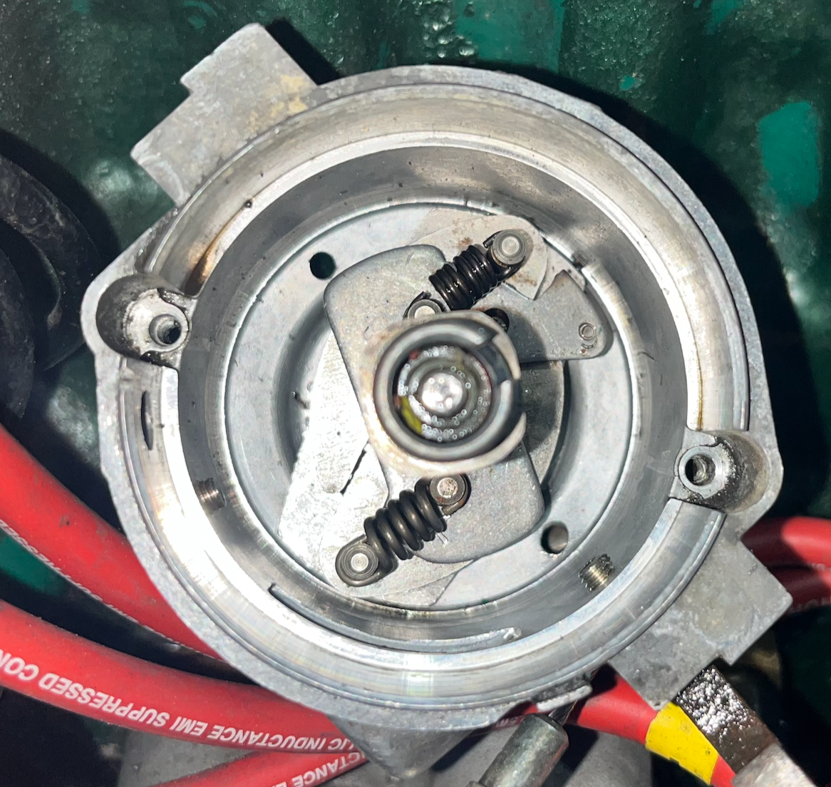 Checking the distributor mechanical advance and other points of wear ...