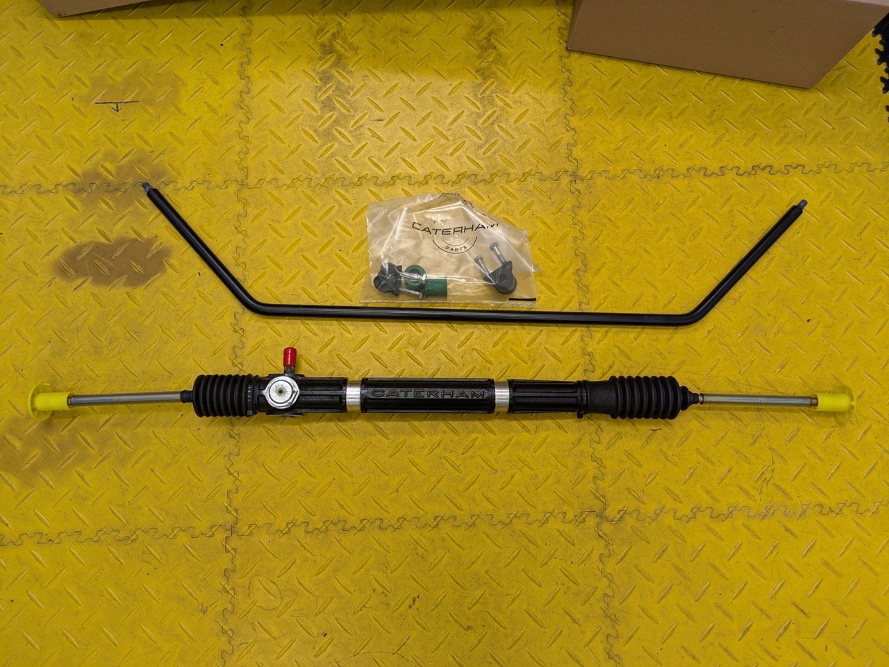 Steering rack, front anti-roll bar, and rear brakes, hubs, and de-dion ...