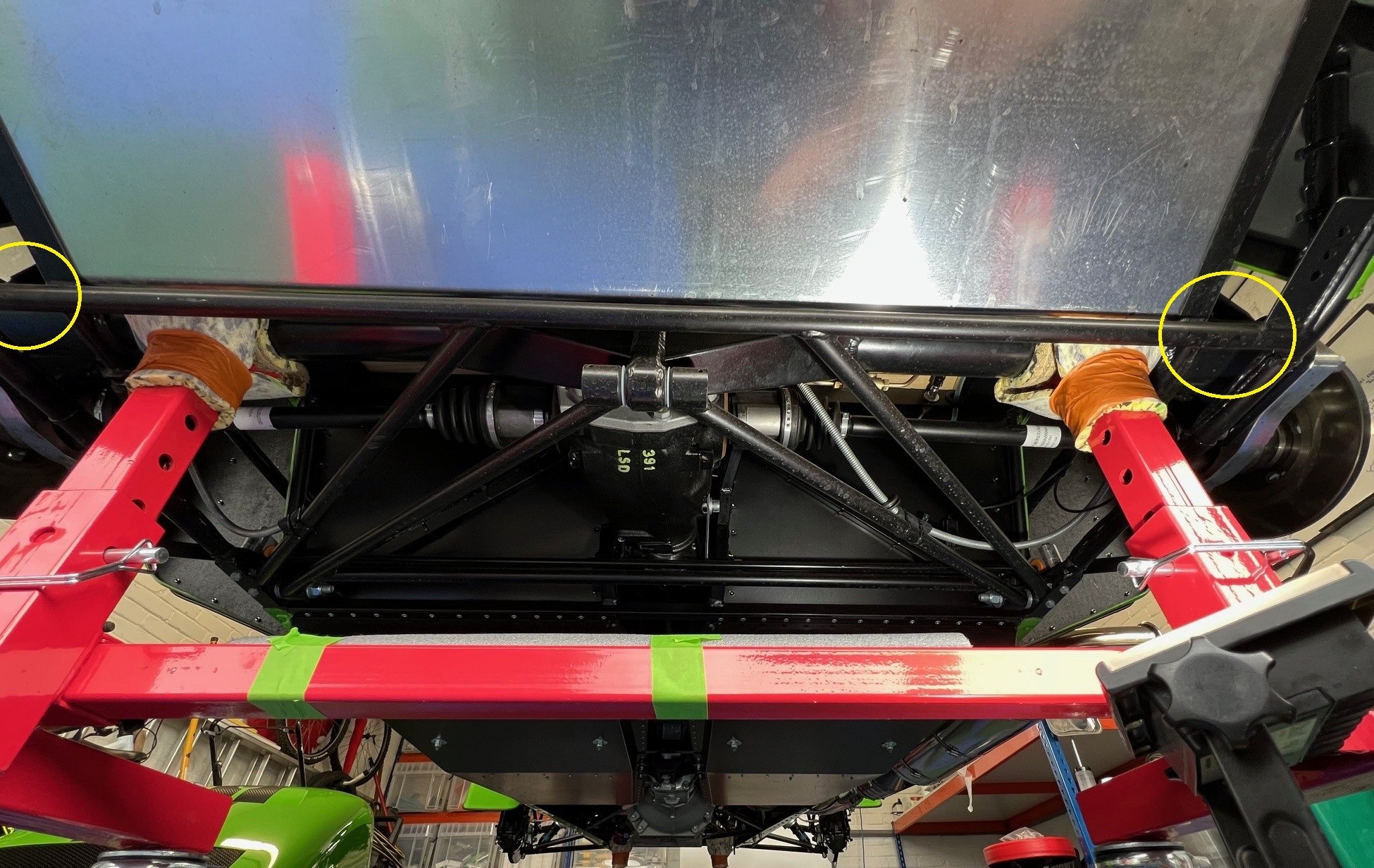 Where is safe to put the rear axle stands to access the diff fill plug ...