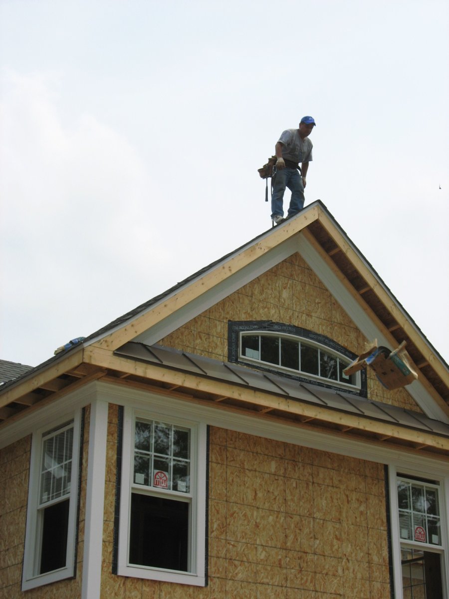 Caught unsafe practice on construction site, throwing shingles off roof ...
