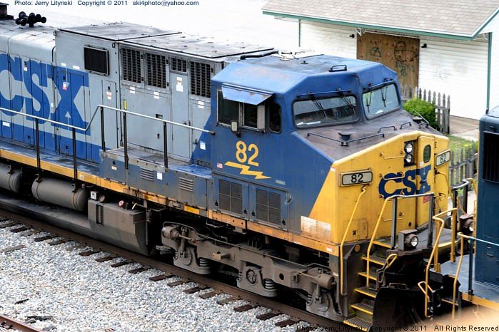 One of five locomotives, CSX Engine No. 82, going through downtown ...