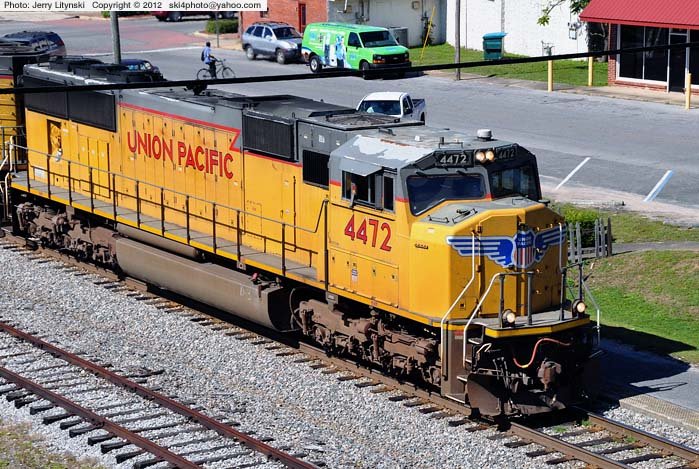 Just east of Main Street: Union Pacific [UP] Engine No. 4472 leads a ...
