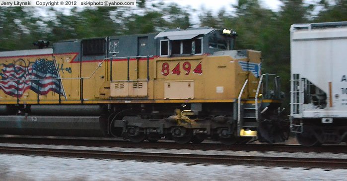 Union Pacific [UP] Engine No. 8494 , running 6th in a 6-locomotive ...