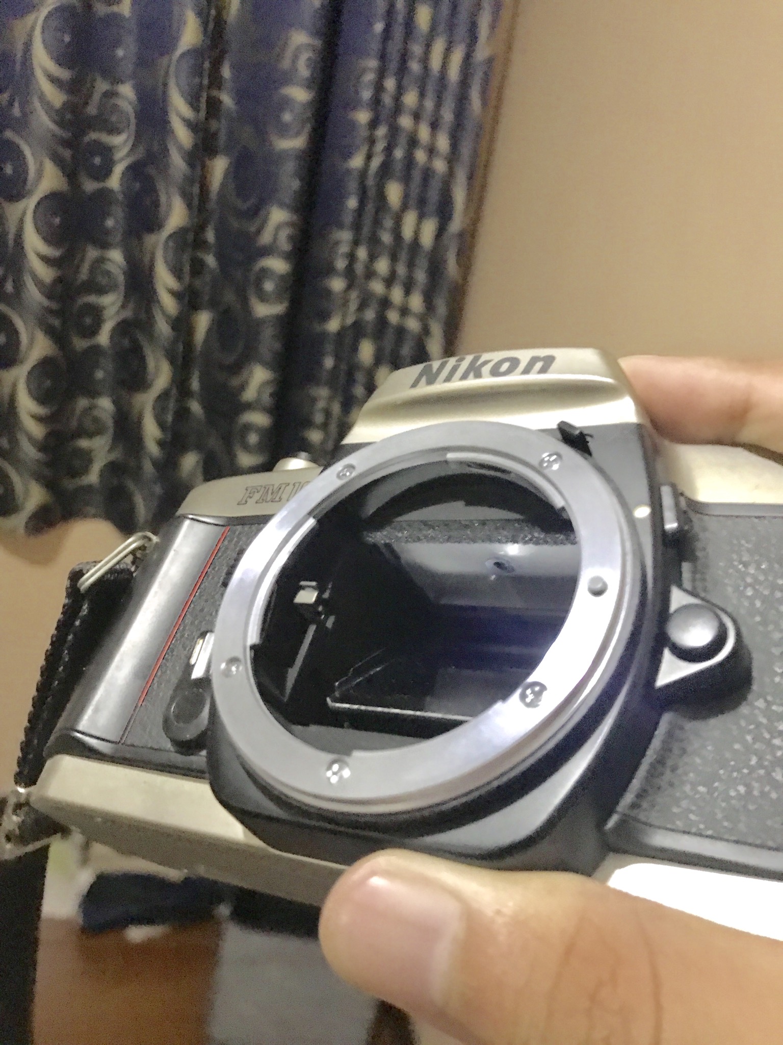 Nikon FM10 mirror gets stuck when pressing the shutter button - Nikon ...