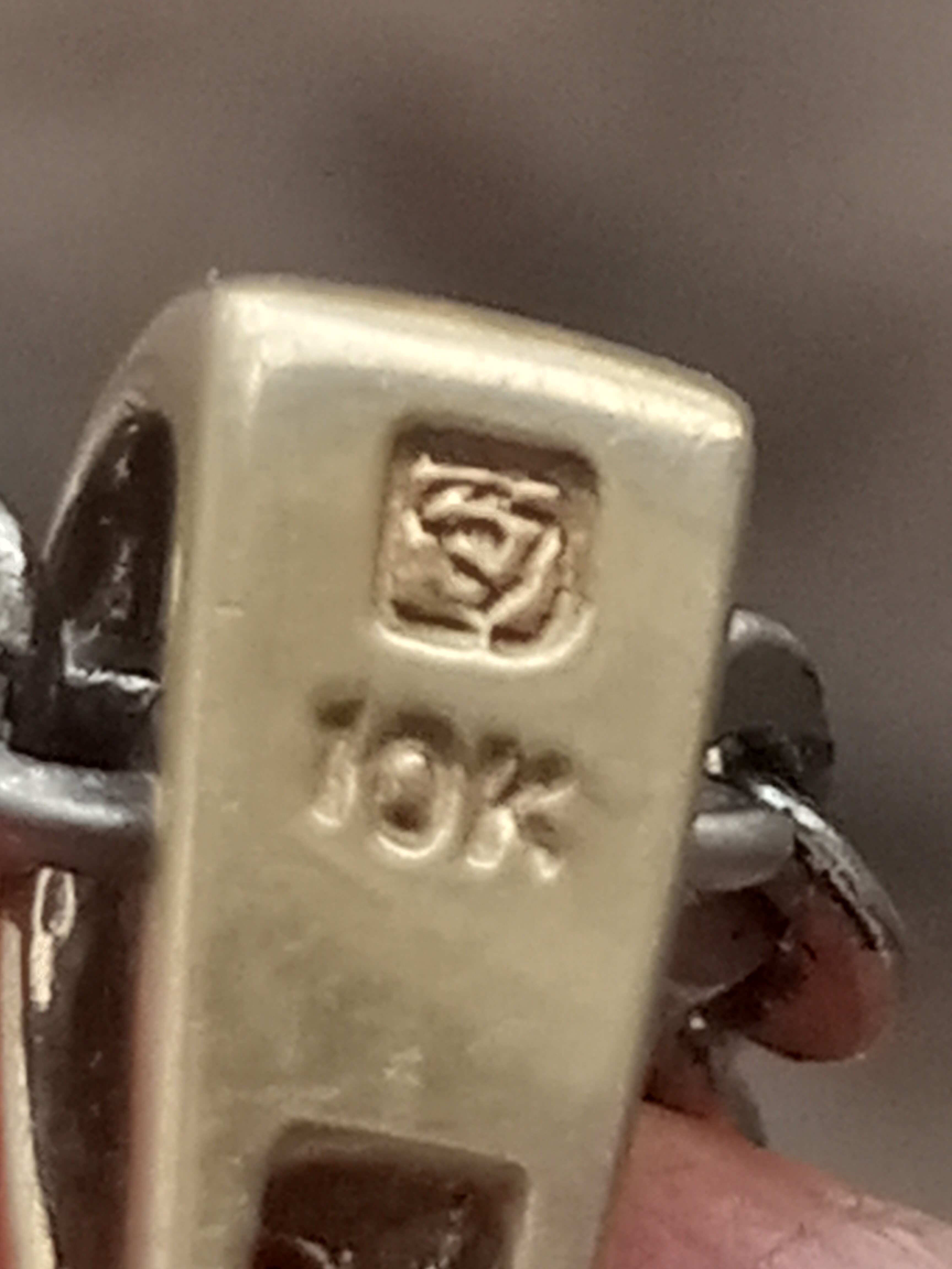 Unknown hallmark on gold pendant. Any thoughts or ideas would be ...