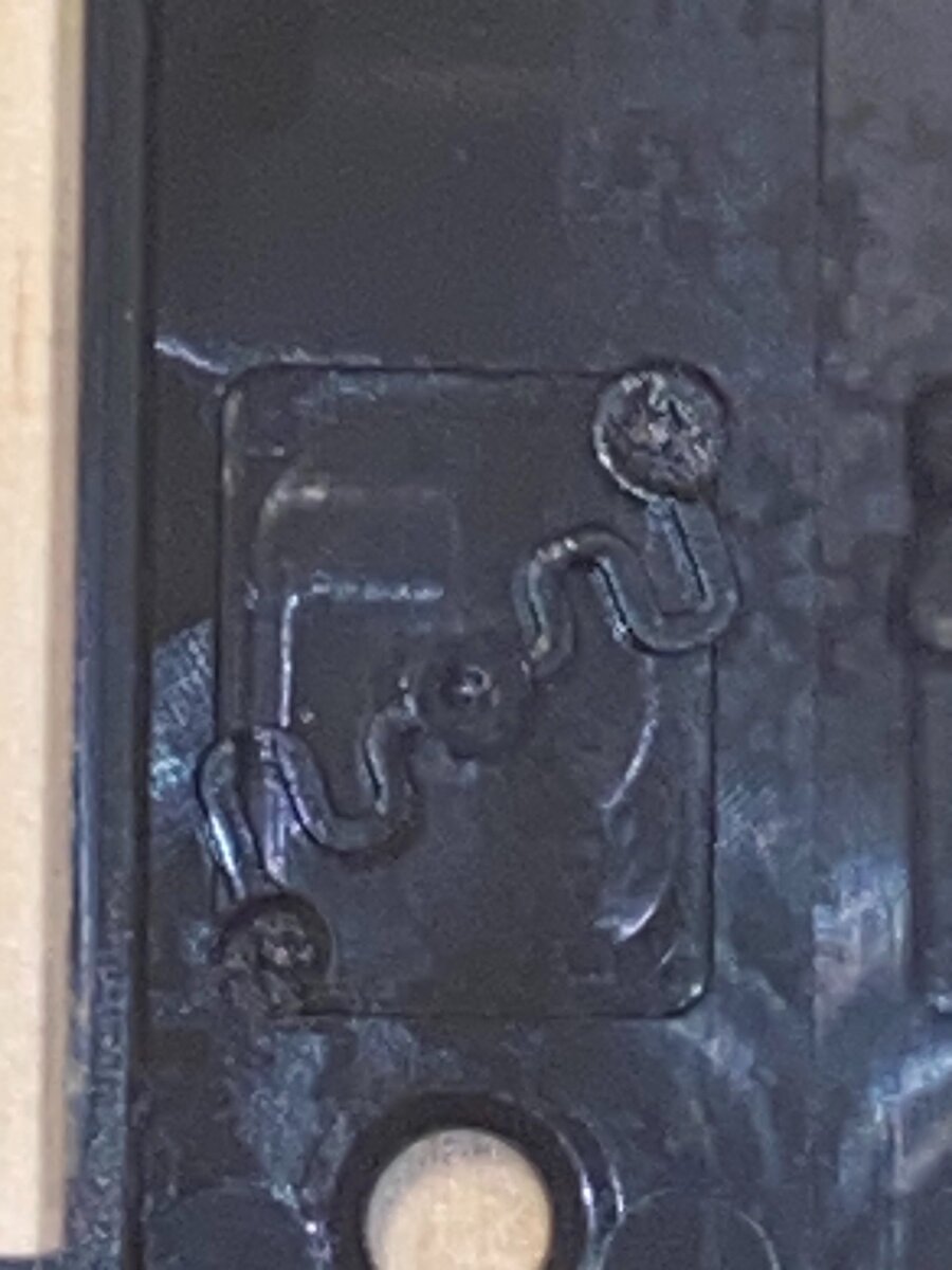 750d what is this raised plastic piece behind front bezel? - Build ...