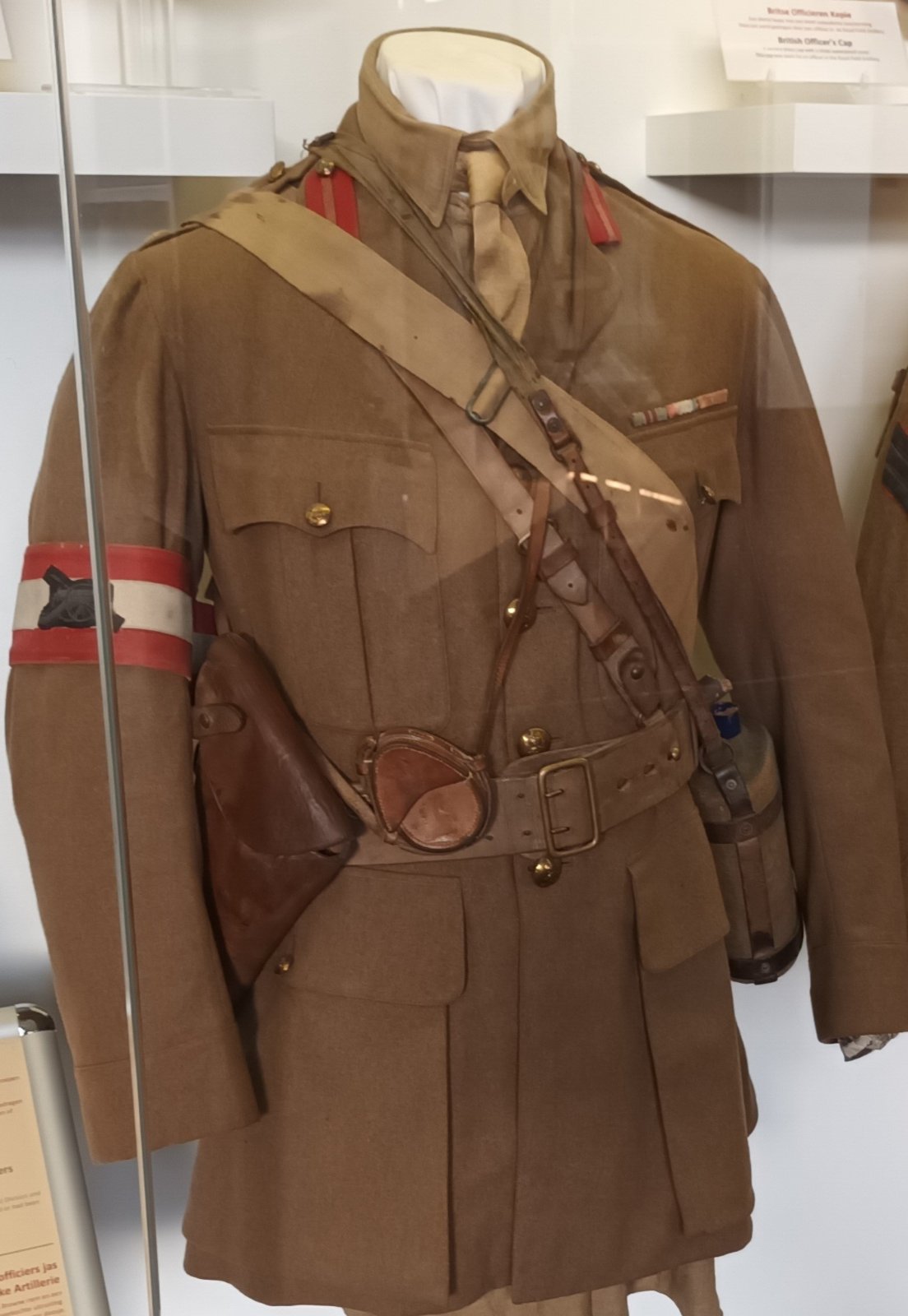 Uniforms on display in the Ariane Hotel, Ypres - Uniforms,Cap Badges ...