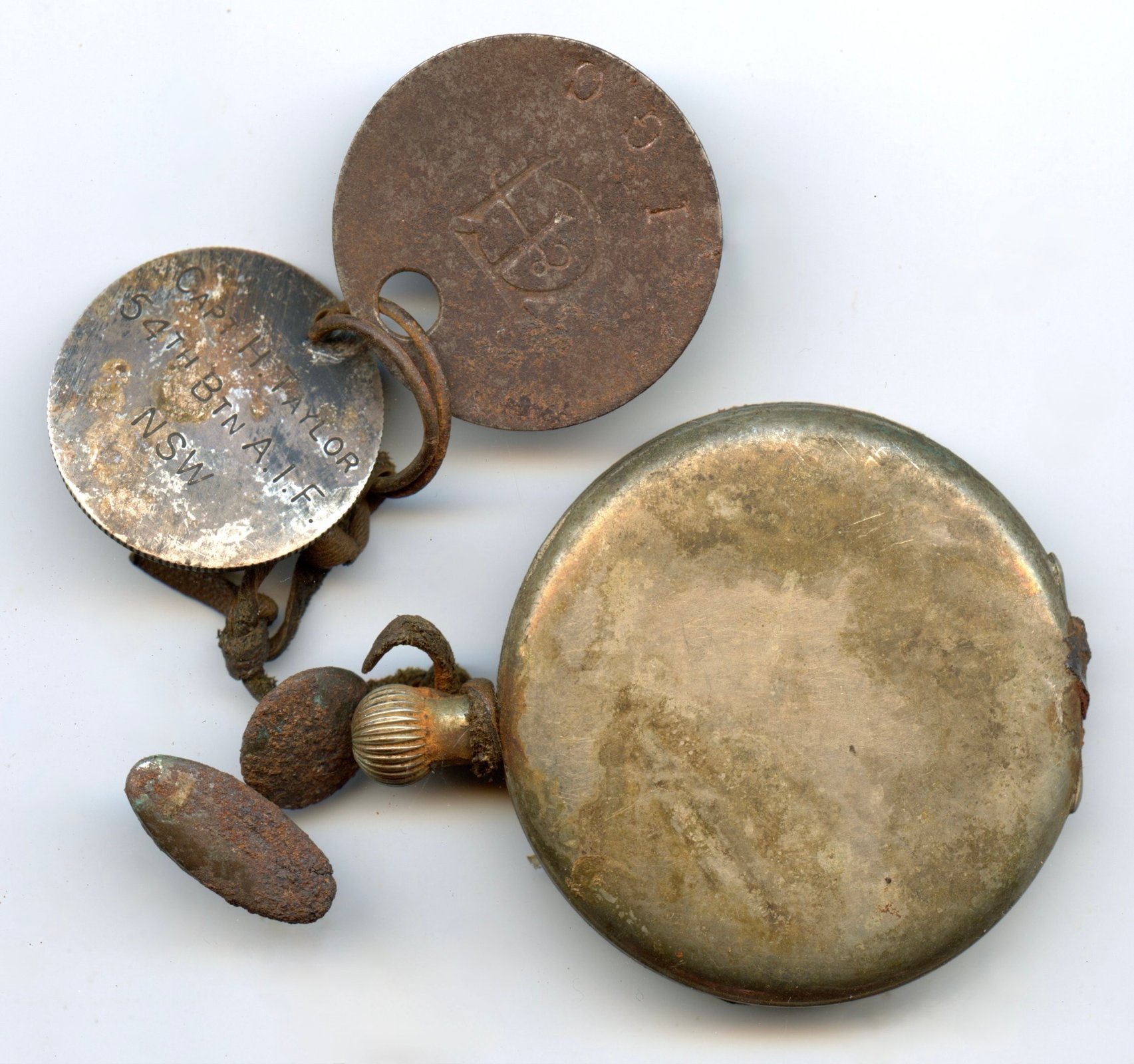 Help to Identify a tag attached to three relic items recovered at ...