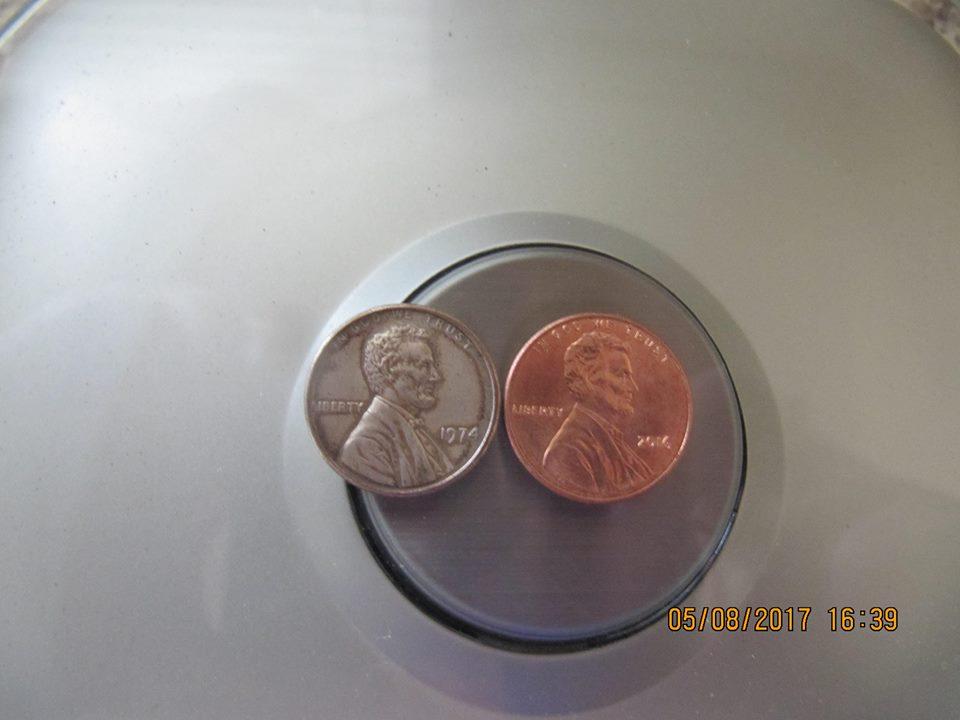 What is this coin? 1974 penny, sticks to magnets? - US, World, and ...