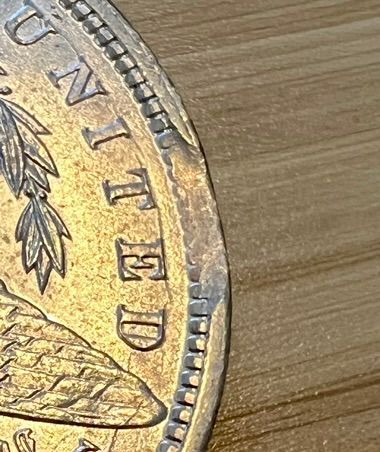 Morgan 1900-O Silver Dollar with strange defect on edge - mint error or ...