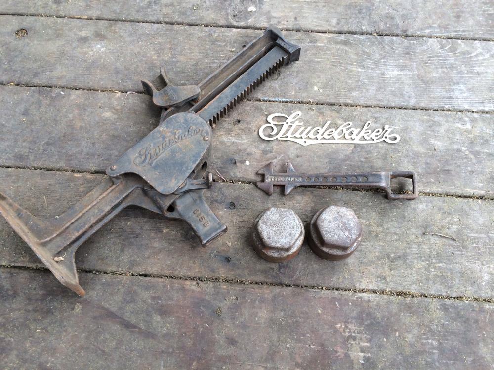 Studebaker jack, hubcaps, radiator script, and wrench for sale ...
