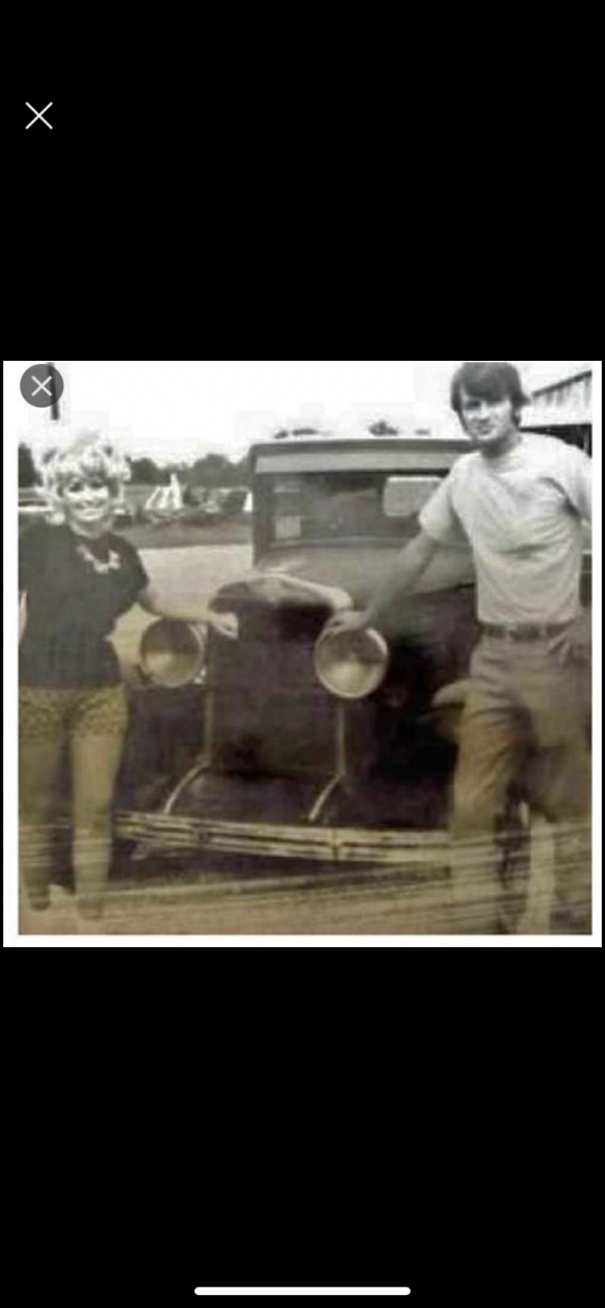 What year and make is this car Dolly Partons posing near? - General ...