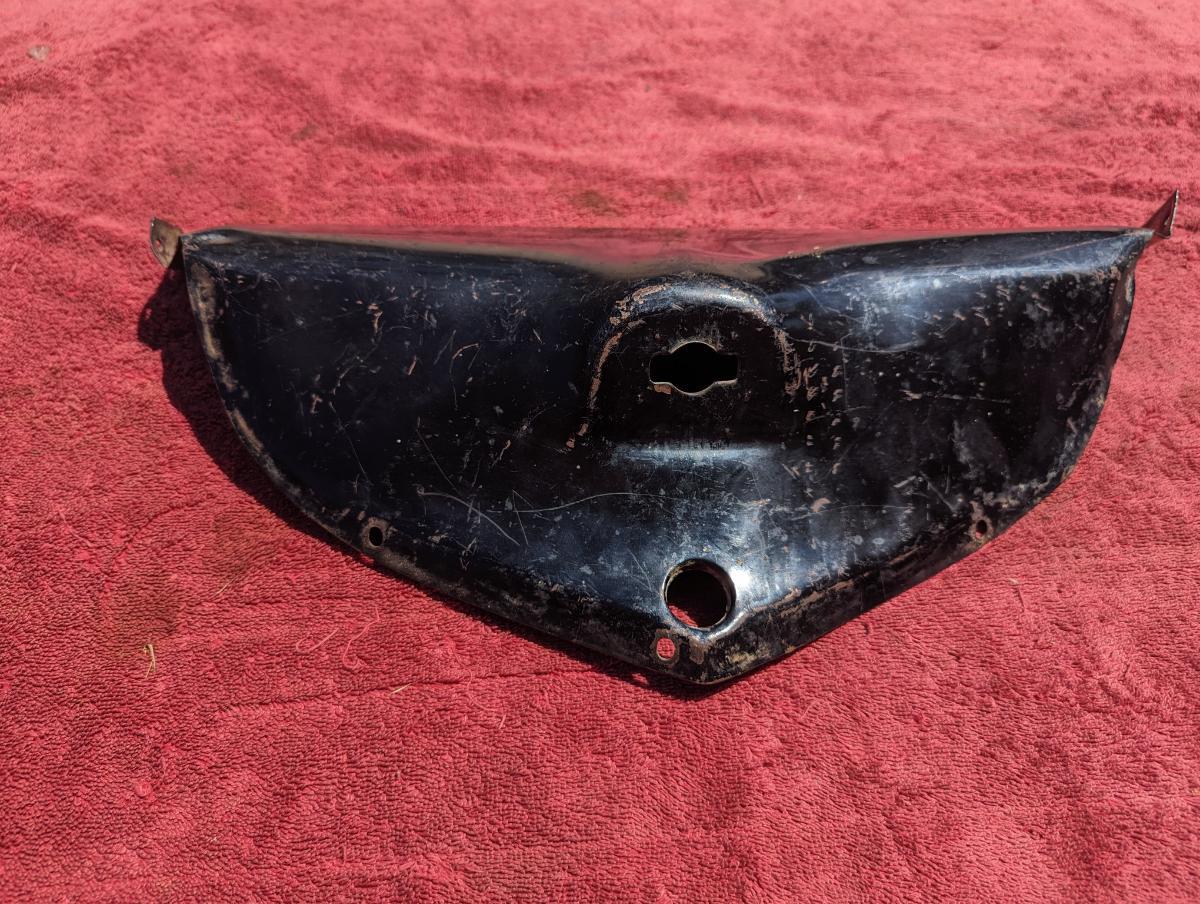 Unable to identify 2 different NOS grille housing lower radiator splash ...