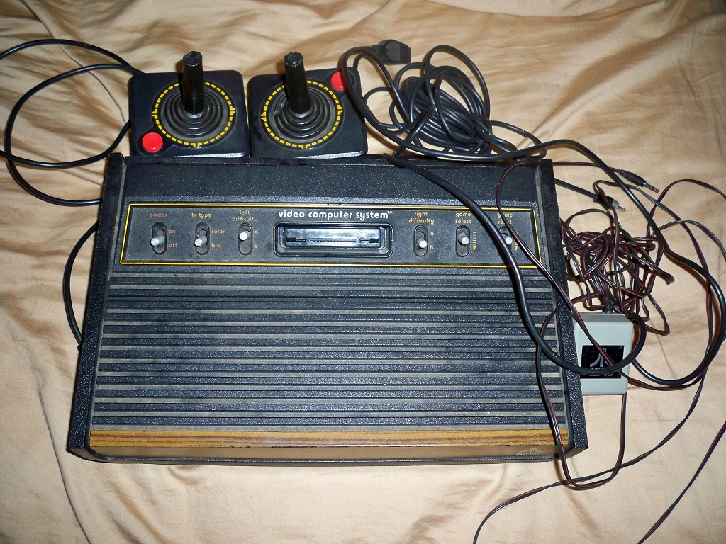 Atari Heavy sixer w/ 2 controllers, paddles, gray power supply, and box ...
