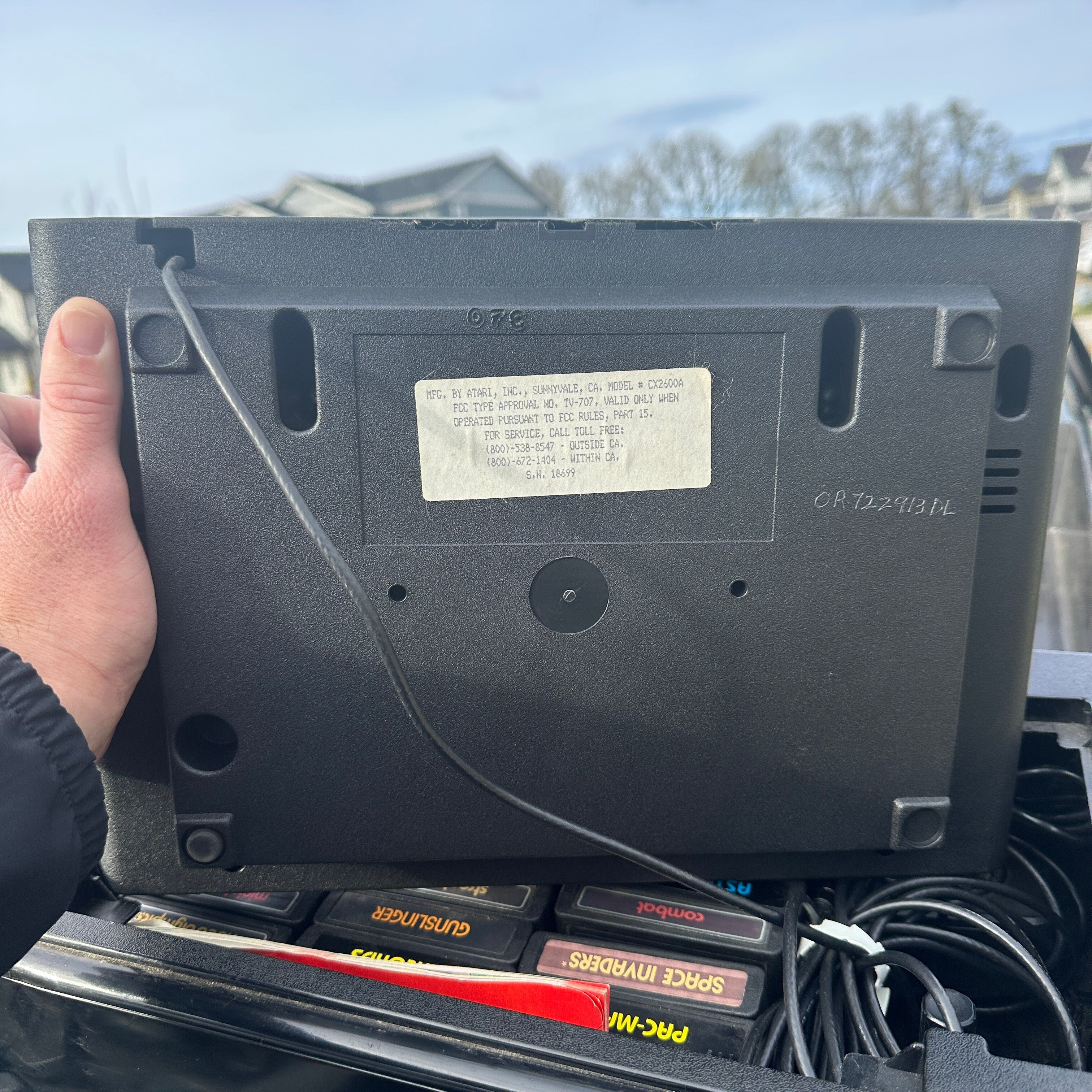 Looking for info on this Atari system. The label on the back and the SN ...