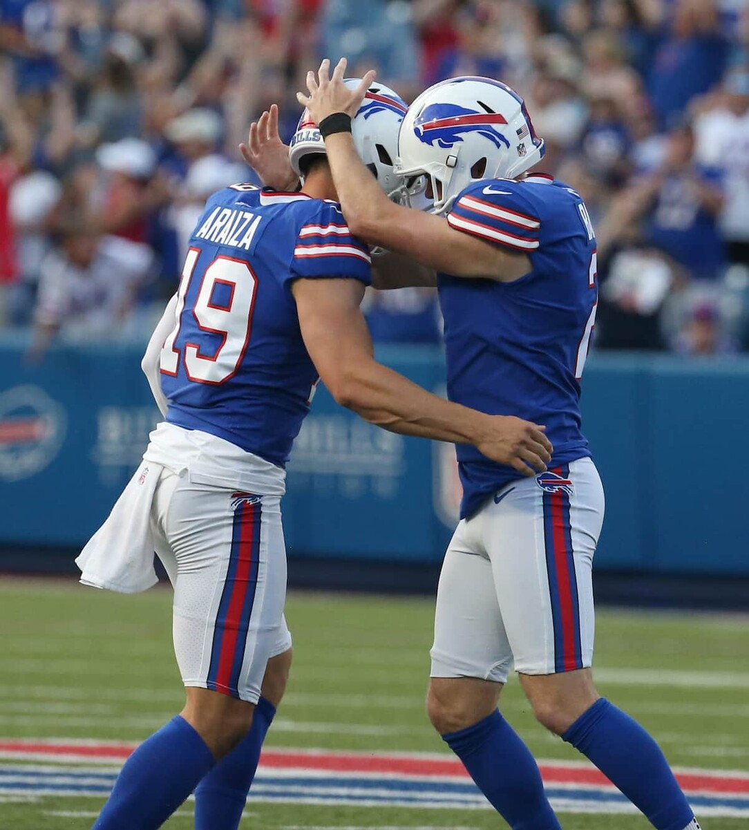 Tyler Bass celebrates his game winning field goal with holder Matt ...